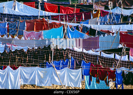 Laundry drying on rope on Ghat in sunny day . Varanasi. India Stock ...