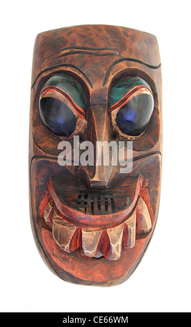 Carved wood wooden ceremonial tribal masks for sale at a street market ...