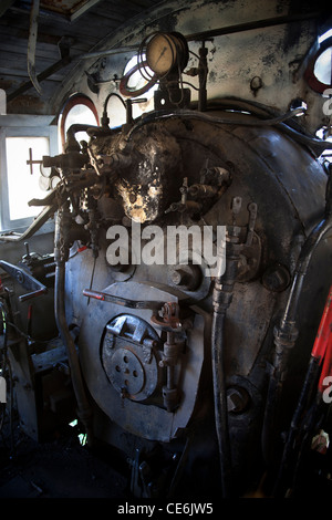 a steam locomotive engine room with the boiler and valves Stock Photo ...