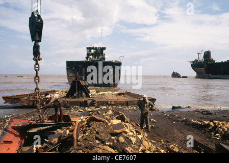 Indian workers working at Alang ship breaking yard ; Alang ; Bhavnagar ; Gujarat ; India ; Asia ...