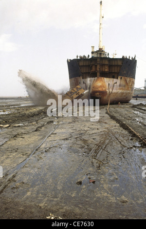Indian workers working at Alang ship breaking yard ; Alang ; Bhavnagar ; Gujarat ; India ; Asia ...