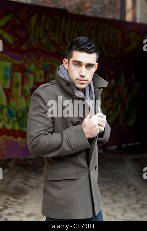 Male model striking a pose in an urban setting, in Leeds, West Stock ...