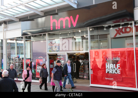 People walking past HMV shop along Queen Street in Cardiff City Centre ...