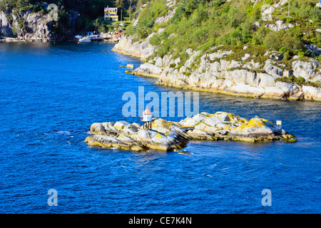 A small Lighthouse on an islet in the Bergen Fjord, Norway Stock Photo ...