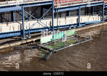 Floating trash collector on the Yarra River in the centre of Melbourne ...
