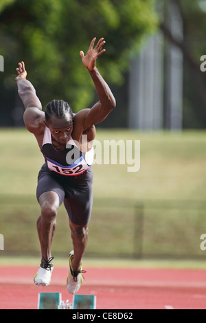 Athlete Sprinting From Starting Blocks Stock Photo - Alamy