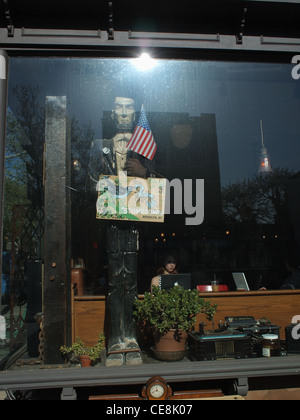 Coffee shop window with statue of Lincoln, Brooklyn, New York Stock ...