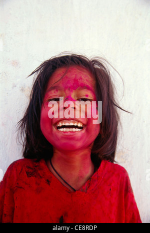 Indian girl celebrating holi festival Stock Photo - Alamy