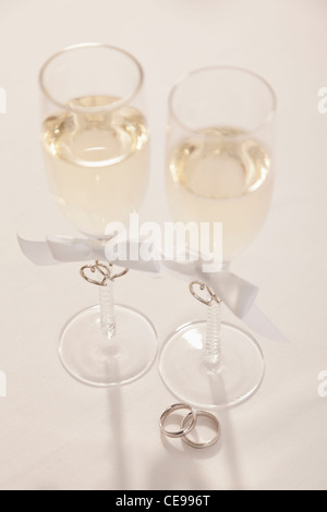 High angle view of wedding rings with leaves on tree stump Stock Photo ...