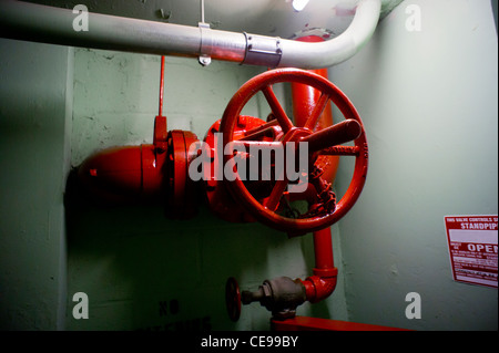 Multiple valve red fire department standpipe outside building Stock ...