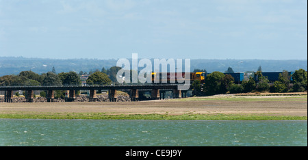 Freight train crossing the rail viaduct across the River Wansbeck near ...