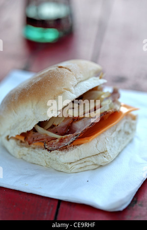 sandwich bacon barm eating on the street Stock Photo - Alamy