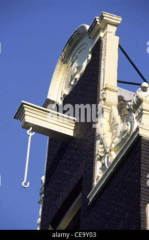 typical Amsterdam house with a hook on a beam under the roof for ...