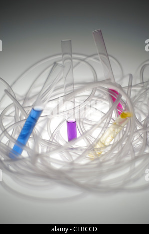 Plastic test tubes containing liquid samples are displayed on a rack ...