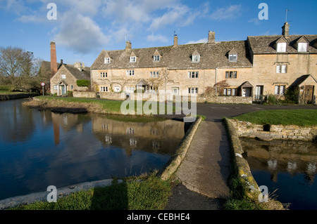 The River Windrush at Windrush Mill in the Cotswold village of Stock ...