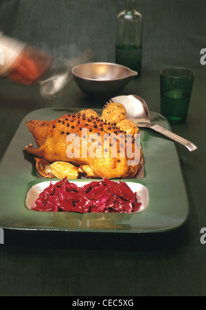 Duck with red cabbage and dumplings Stock Photo - Alamy