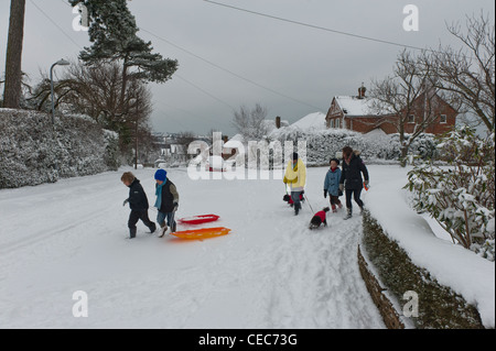 Children with sleds in winter scene from Sebenardi Village of Aladag ...