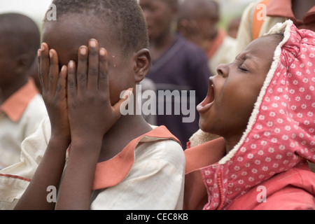 School children praying during assembly at school Stock Photo - Alamy