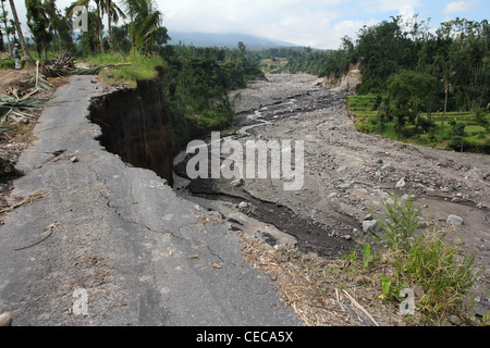 Lahar damage to road from Mt. Merapi volcano eruption Yogyakarta ...