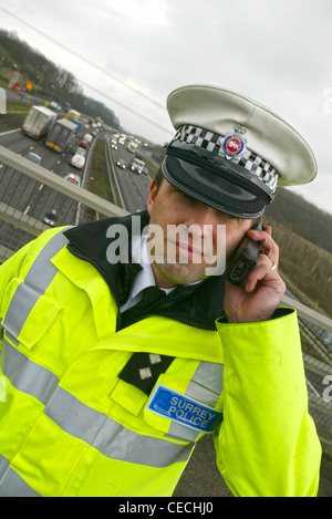 British police officer uniform with high visable yellow jacket Stock ...