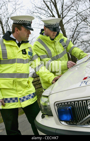 Police officers survey a road traffic accident UK Stock Photo - Alamy