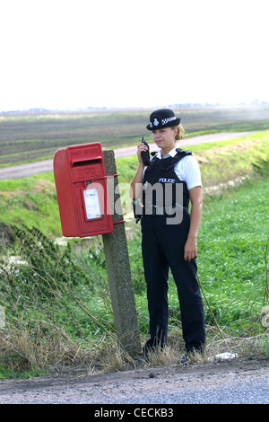 British Police officer patrolling rural area of Suffolk Stock Photo - Alamy