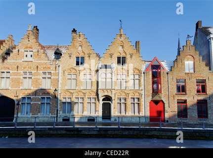 Traditional flemish architecture with Canal Houses of Bruges, Belgium ...