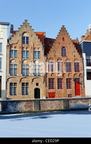 Traditional flemish architecture with Canal Houses of Bruges, Belgium ...