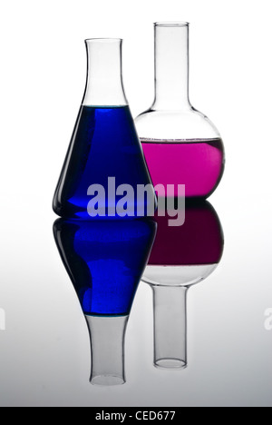 Two colorful flasks isolated on white Stock Photo - Alamy