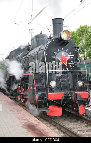 Classic steam locomotive front side detail. Old fashioned industrial ...