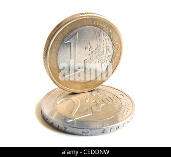 The bank statement of a bank and some coins of the euro currency ...