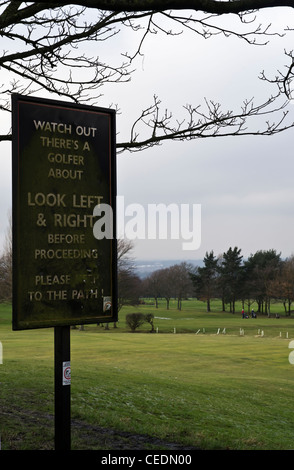 Warning sign on golf course Stock Photo - Alamy