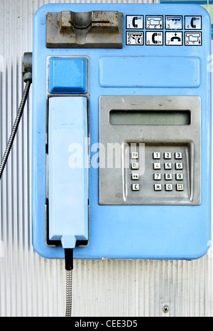Close up of blue modern Payphone in airport Stock Photo - Alamy