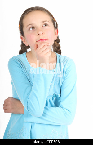 girl wondering and looking up Stock Photo - Alamy