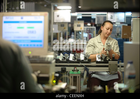 Two female assembly line workers enjoy a lunch break at Douglas ...