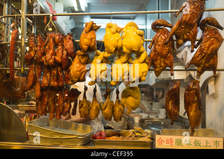 Chinese restaurant display window with barbecued meats, char sui pork ...