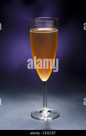 Champaign glass in front of gold glitter background Stock Photo - Alamy