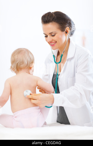 Pediatrician doctor examine baby using stethoscope Stock Photo - Alamy