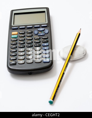 Calculator and pencil Stock Photo - Alamy