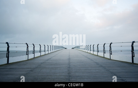 A view along the old Victorian Pier at sunset, Southport, Merseyside ...