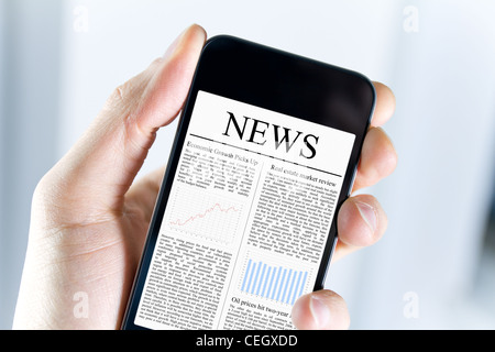 business newspaper with mobile phone, pda, blurred, zooming Stock Photo ...