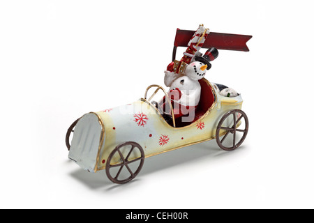 snowman driving old fashion classic car Stock Photo - Alamy
