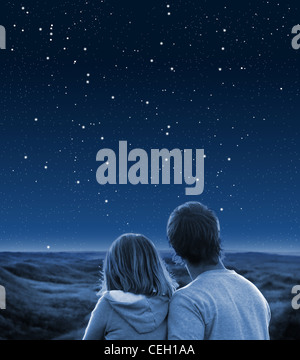 Romantic couple under a starry sky, embracing under the night sky, love ...