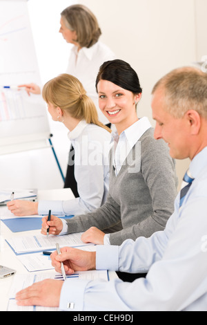 Group young business colleagues giving high five after success work ...