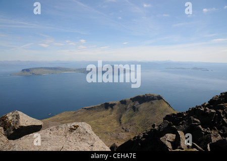 The isles of Eigg and Rum seen from the mainland, Western Scotland, UK ...