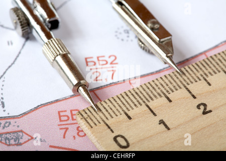 Topographic map of district with measuring instrument, ruler and a ...