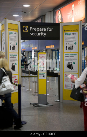 Hand luggage security check gate with warning signs & information Stock ...