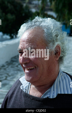 Middle aged Greek Man in white tee shirt Stock Photo - Alamy