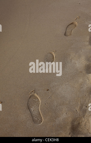 trace of the human foot on the sand Stock Photo - Alamy