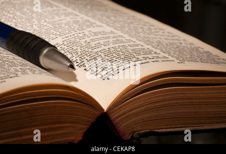Open bible with pen Stock Photo - Alamy